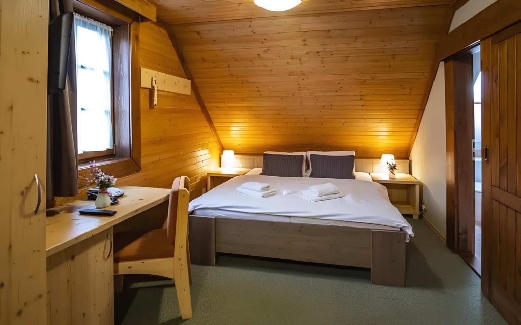 Family room in Sojka resort with breakfast and pool included